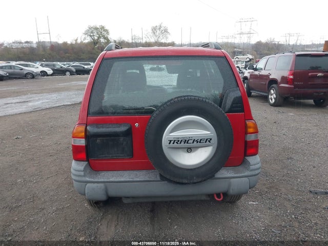 2CNBJ13C736938103, 2003 Chevrolet Tracker Hard Top Base vehicle history