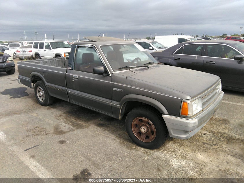VIN: JM2UF2111G0533855 | MAZDA B2000 1986 car history - Stat.vin